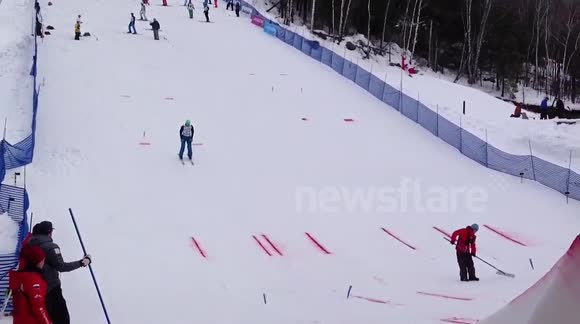 Aerial skiing action Lloyd Wallace triple twisting double somersault ...