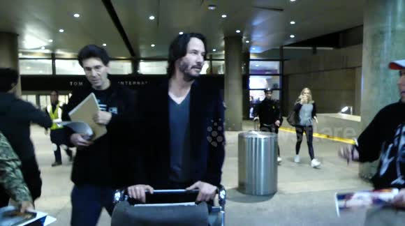 Keanu Reeves arrives at LAX Airport in California - Buy, Sell or Upload ...