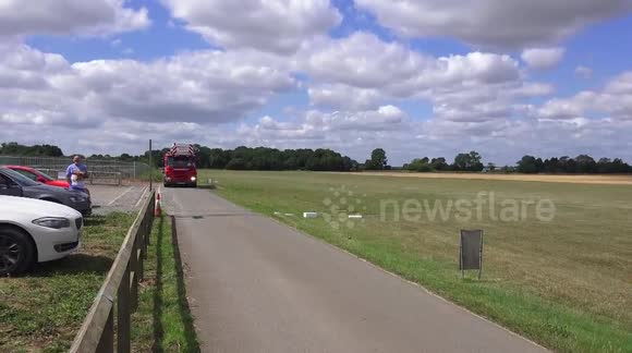 Dramatic moment a replica Spitfire lands without undercarriage - Buy ...