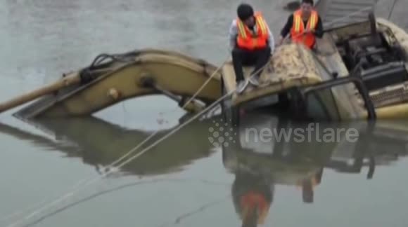 Firefighters rescue man from sunken floating excavator - Buy, Sell or ...