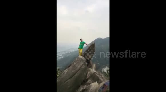 Risky photo leads to man falling down cliff - Buy, Sell or Upload Video ...