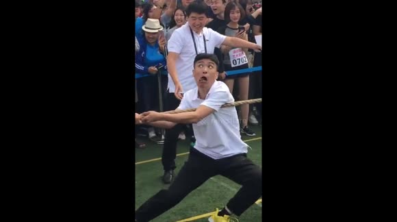 Man wins tug of war by pulling faces to put off opponents - Buy, Sell ...