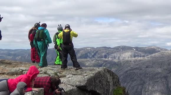 Base jumpers exiting 3000ft high cliff at Heliboogie BASE jumping event ...