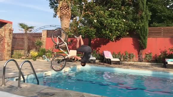 Front flip into the pool - Buy, Sell or Upload Video Content with Newsflare