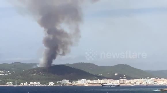 Wildfire rages near tourist resort in Ibiza - Buy, Sell or Upload Video ...