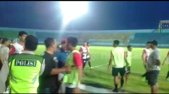 Footballers fight at soccer game in Indonesia - Buy, Sell or Upload ...