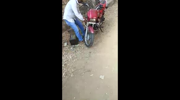 snake in bike - Buy, Sell or Upload Video Content with Newsflare