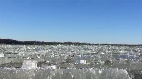 Mesmerising footage of ice waves breaking on frozen lake - Buy, Sell or ...
