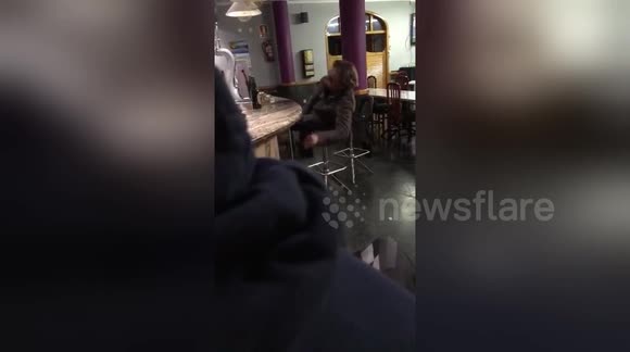 Customer performs spectacular windmill falling off bar stool - Buy ...