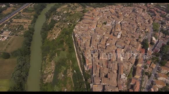 Aerial, Tiber river and antique town perched on the rock Orte in Lazio ...