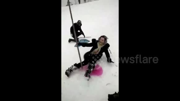 Woman knocks down tree in hilarious snow sledding fail - Buy, Sell or ...