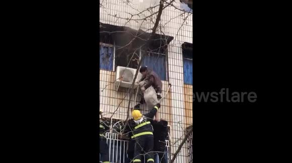 Disabled man rescues pregnant woman trapped in burning building - Buy ...