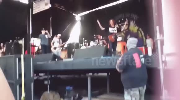 Singer Jumps Off Stage and Fights a Security Guard Who Pushed a Fan ...