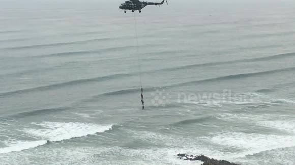 People filmed dangling from a helicopter in Peru - Buy, Sell or Upload ...