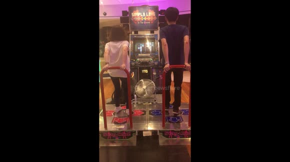 Couple's coordinated dance moves while playing game will mesmerize you ...
