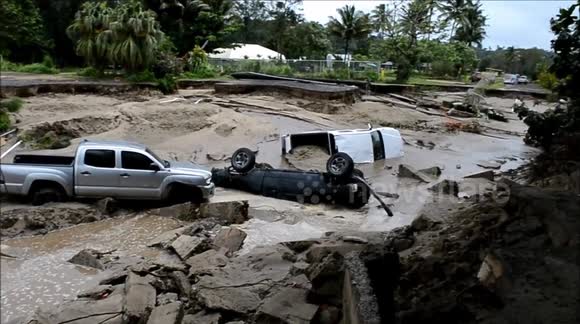 Collapsed buildings and sunken homes: Floods devastate Hawaii's Kauai ...