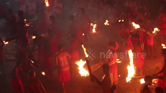 RAW: Hindu devotees take part in religious fire-throwing festival - Buy ...