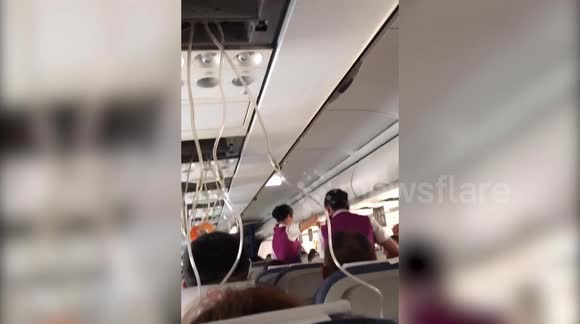 Video captures chaos inside plane after co-pilot is nearly sucked out ...