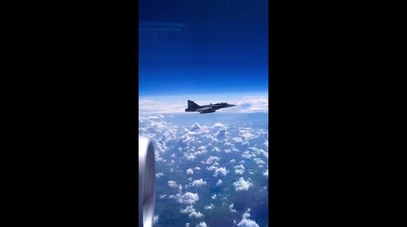 Moment passenger plane 'intercepted and escorted by fighter jets' - Buy ...