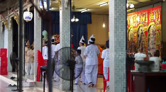A Chinese funeral ritual, at a temple in Thailand. - Buy, Sell or ...