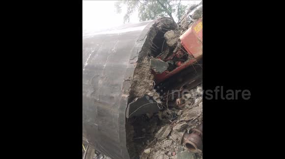 Water tank collapses and crushes digger in demolition fail - Buy, Sell ...