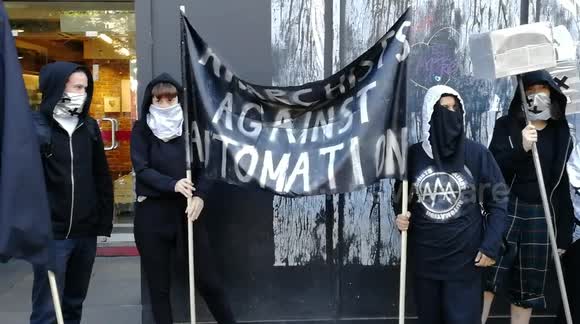 Anarchists Against Automation protest outside London Fashion Week - Buy ...