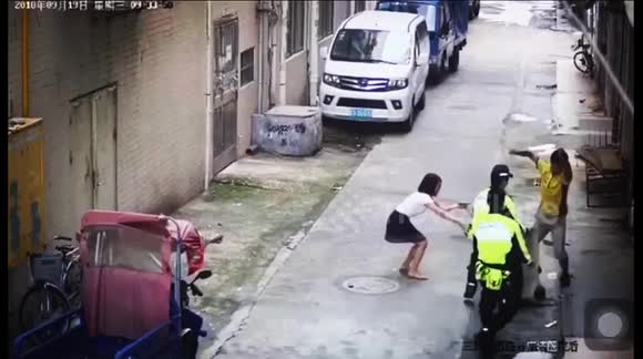 Police and delivery man catch baby falling from first-floor balcony ...