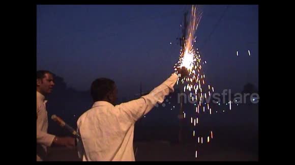 Indian villagers hurl lit firecracker at each other during spiritual ...