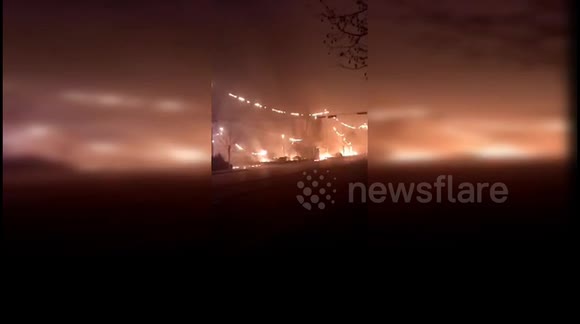 Power lines cause huge fire in Chinese city damaging vehicles - Buy ...