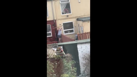 Angry UK neighbours clash in viral 'plank wars' video - Buy, Sell or ...
