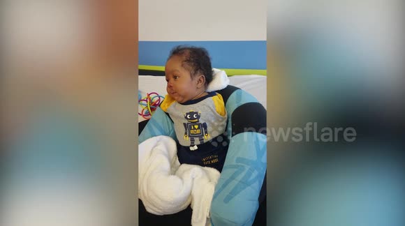 Baby born without arms or legs due to rare genetic condition is ...