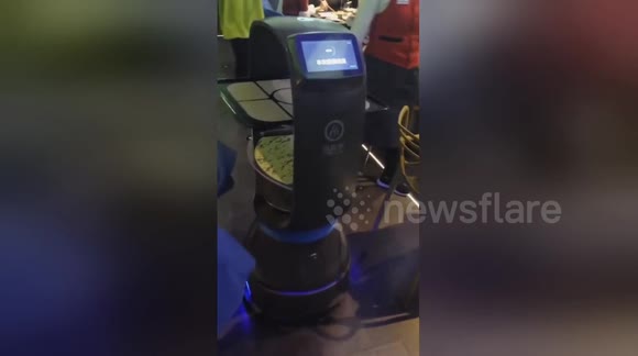 Futuristic hotpot restaurant staffed by robots opens in China - Buy ...