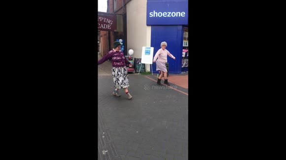 Bust a move! Body-poppin' grannies entertain crowd of shoppers in UK's ...