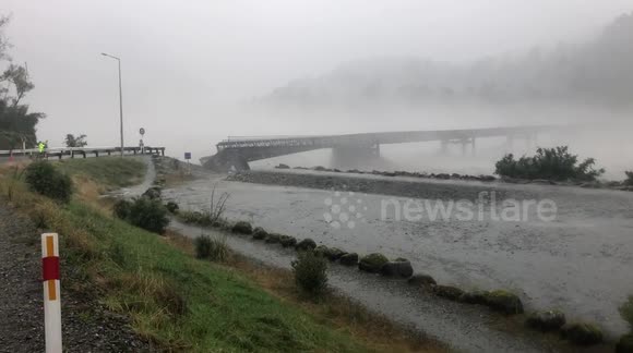 New Zealand bridge washes away as 'monster' rainstorm batters South ...