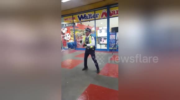 Security guard shows off dance moves outside supermarket - Buy, Sell or ...