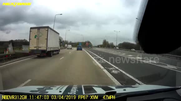 Car in wrong lane on motorway, nearly causes an accident. - Buy, Sell ...