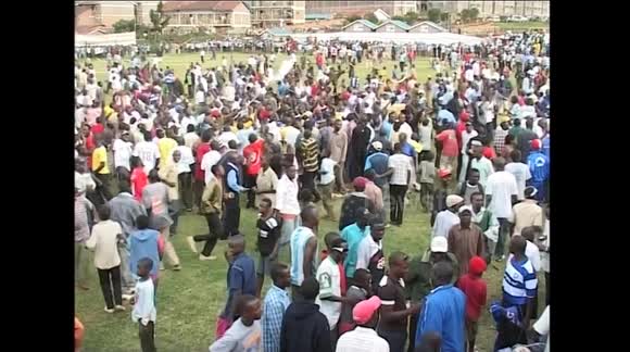 Kenyan football fans break down pitch fence to celebrate victory - Buy ...