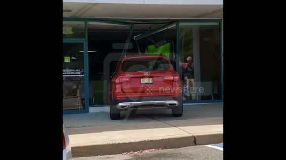 Car vs. Building - Buy, Sell or Upload Video Content with Newsflare