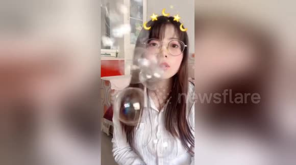 Chinese girl turns herself into 'human bubble machine' - Buy, Sell or ...