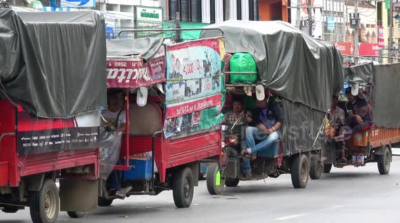 Strange three-wheel vehicles about to cross into Myanmar from Thailand ...