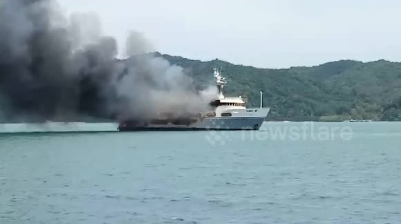 Fire crews battle blaze on luxury superyacht moored on Thai island ...