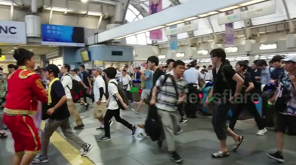 Japanese comic book fans charge through train station on first day of ...