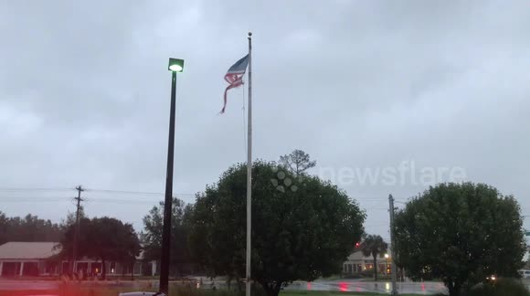 American flag torn but still flying after Hurricane Dorian hits South ...