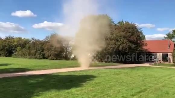 Amazing footage shows moment large dust devil span through a National ...