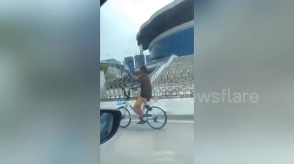 Chinese man spotted cycling with IV drip attached to him - Buy, Sell or ...