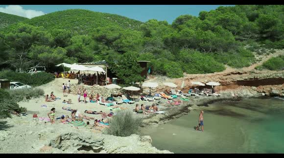 people on the beach in the small cala olivera, ibiza, spain - Buy, Sell ...
