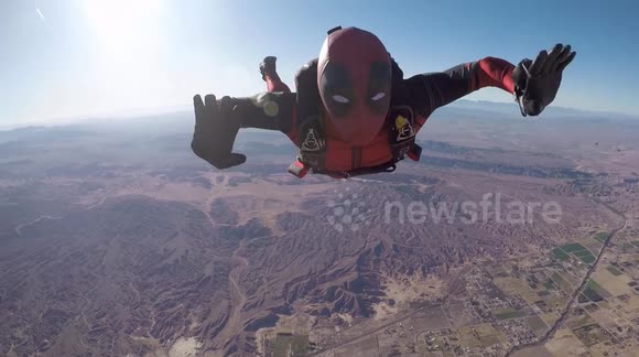 Moment a Marvel fan has celebrated his 100th skydive - by jumping ...