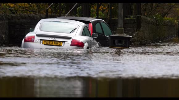 Roads left submerged as flooding strikes towns across the Midlands ...