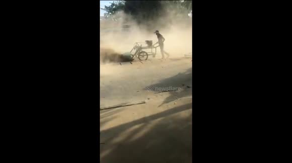 Road worker in Vietnam dubbed 'dust superhero' for his messy job - Buy ...