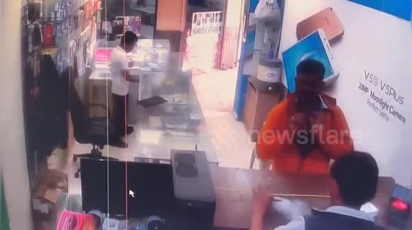 CCTV footage shows smartphone explode at service station in western ...